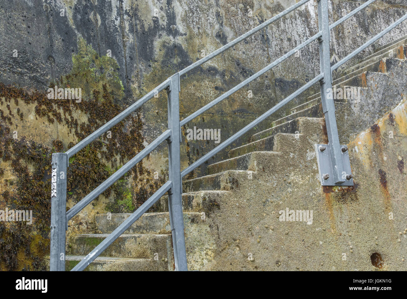 Flight of concrete steps with metal handrail - possible metaphor for ...