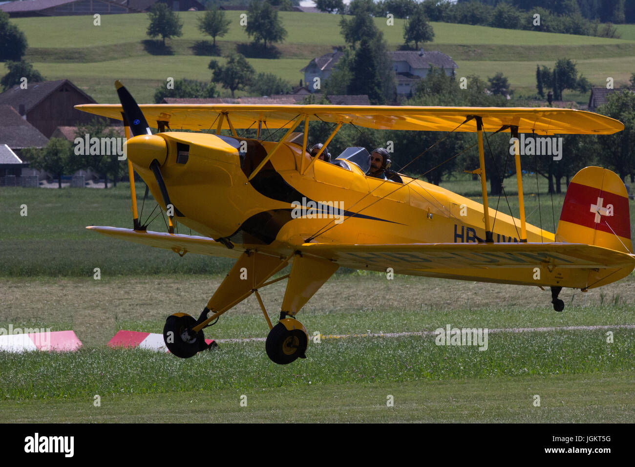 Swiss Yellow Biplane Preparing for Takeoff Stock Photo - Alamy