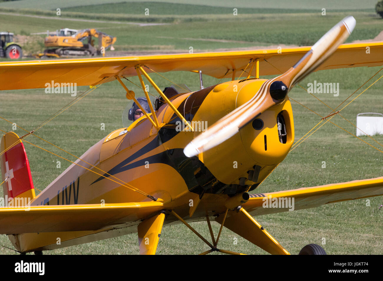Swiss Yellow Biplane Preparing for Takeoff Stock Photo - Alamy