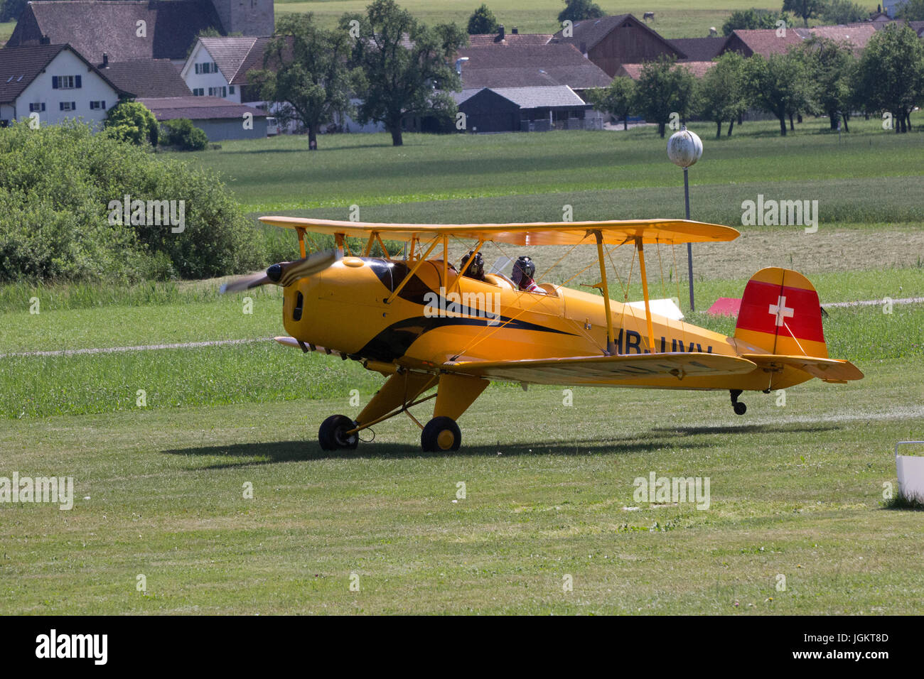 Swiss Yellow Biplane Preparing for Takeoff Stock Photo - Alamy