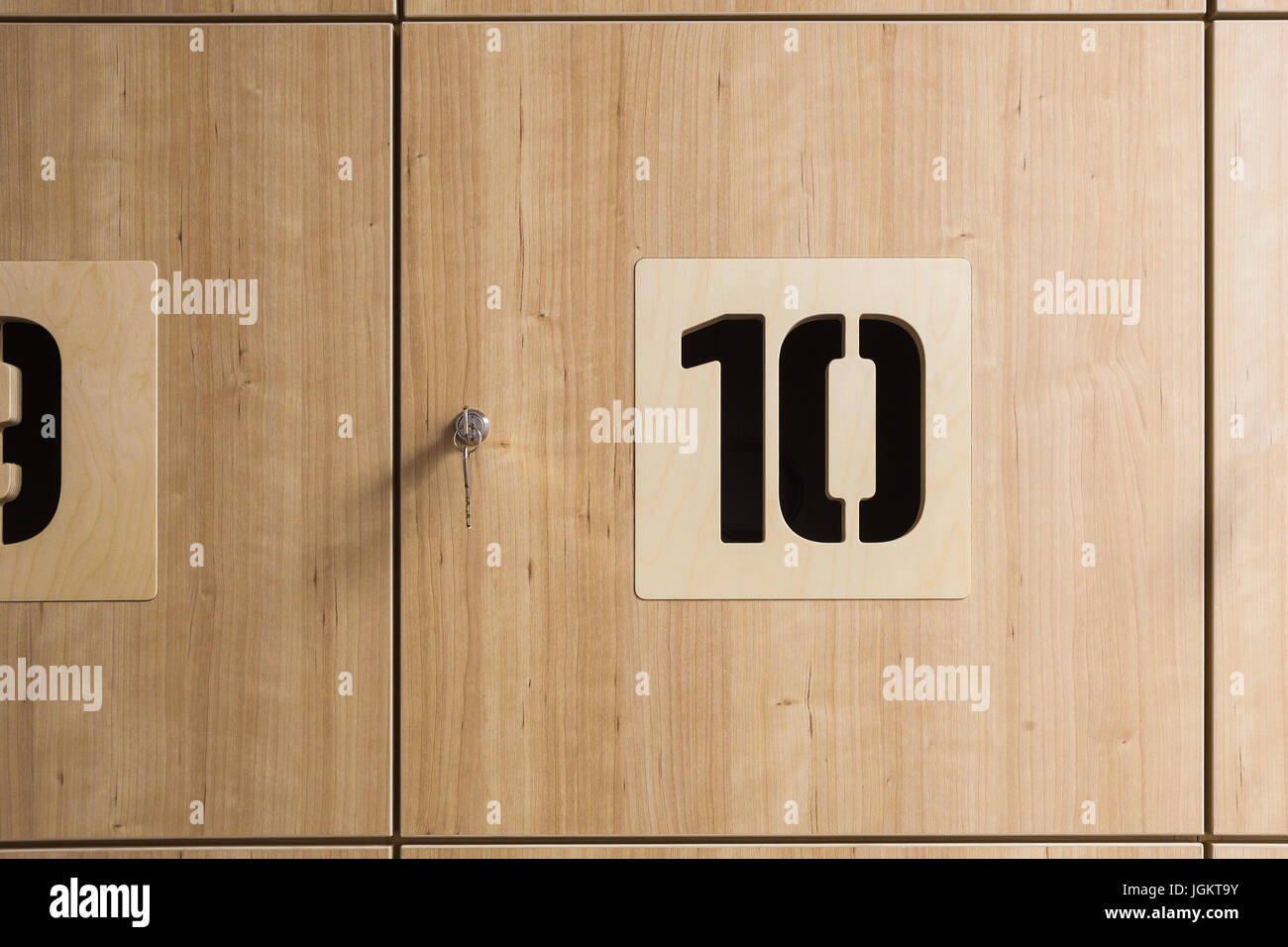 Wooden storage box in the gym with number ten Stock Photo - Alamy