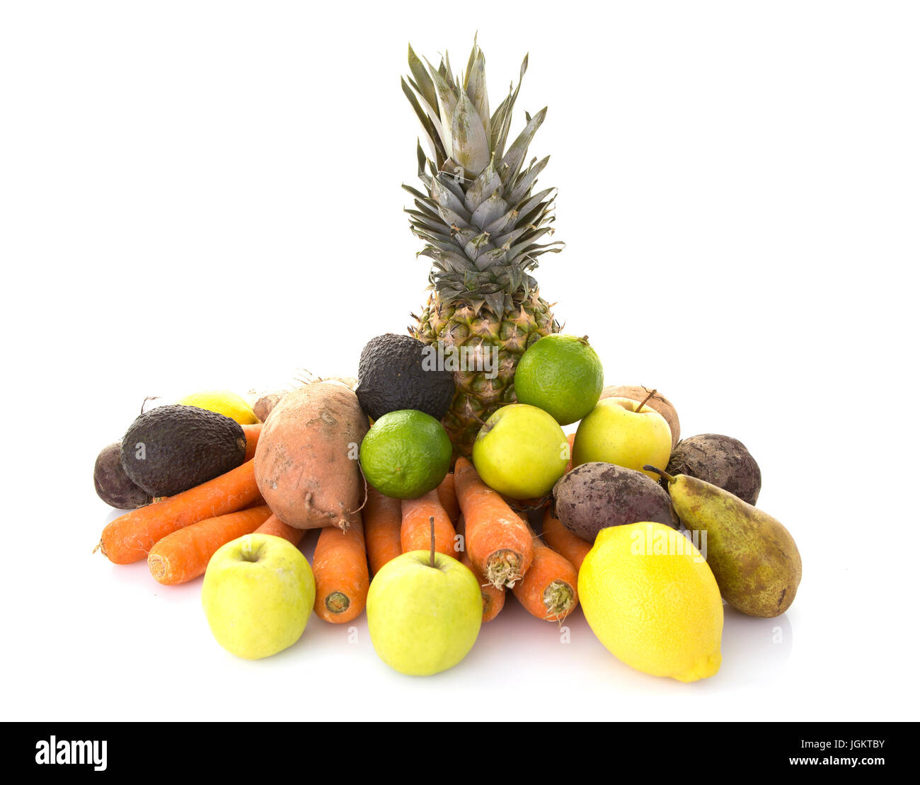 A pile of healthy fresh organic fruit and veg on a white background ...