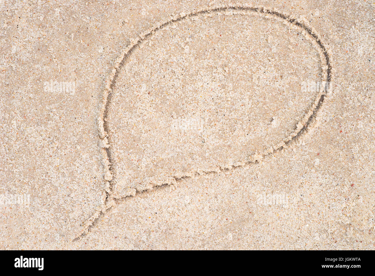 speech bubble drawing in sand background Stock Photo - Alamy
