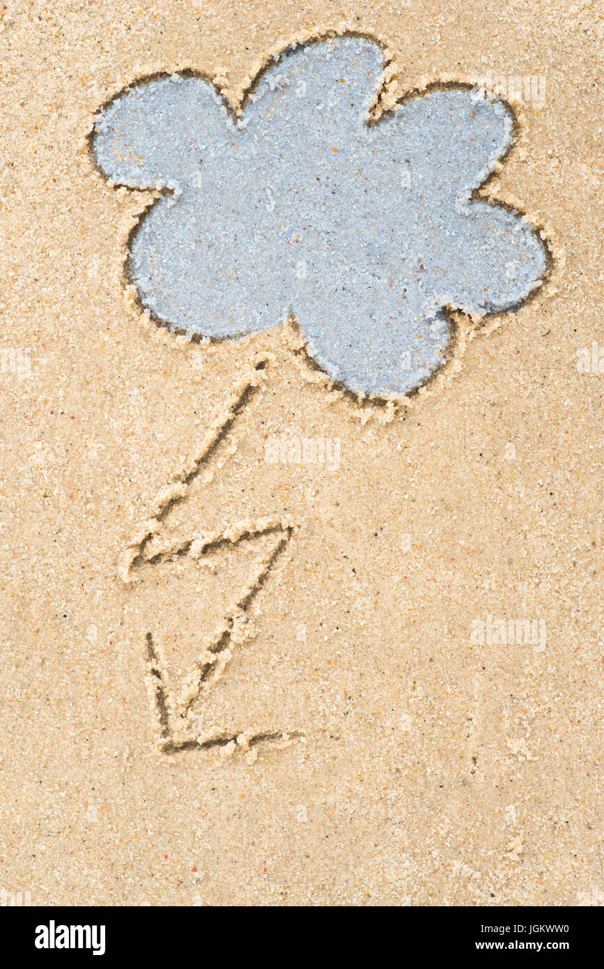 stormy clouds drawing in sand background Stock Photo - Alamy