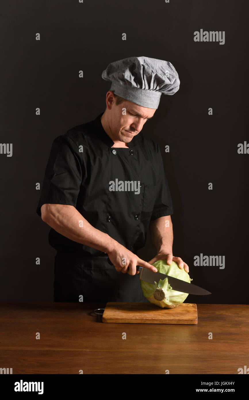 chef chopping a cabbage Stock Photo - Alamy