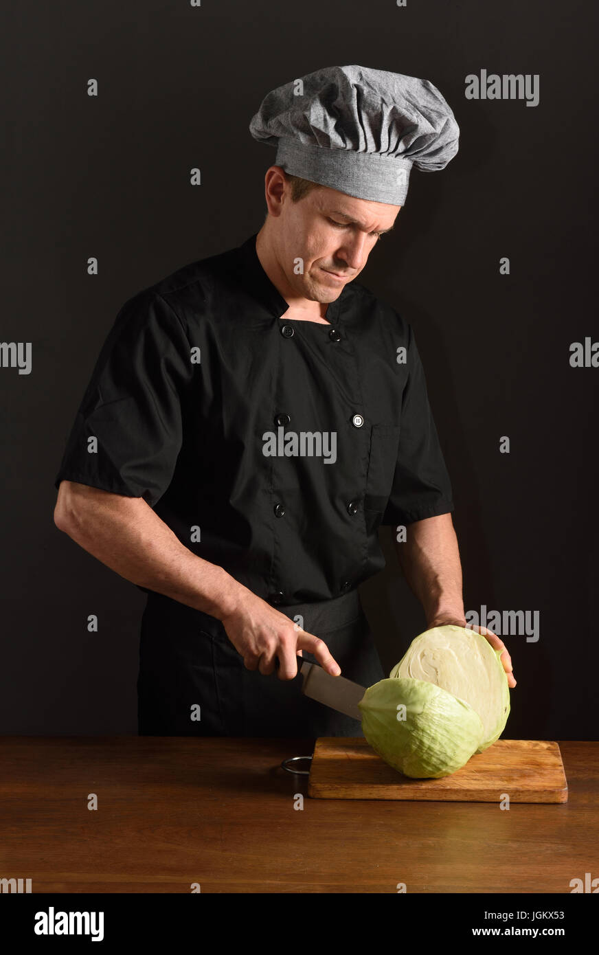 chef chopping a cabbage Stock Photo - Alamy