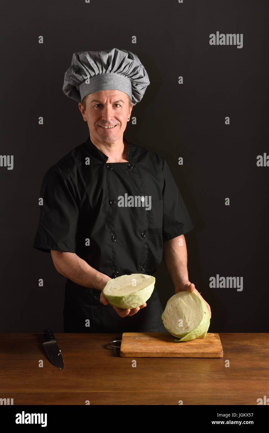 chef chopping a cabbage Stock Photo - Alamy