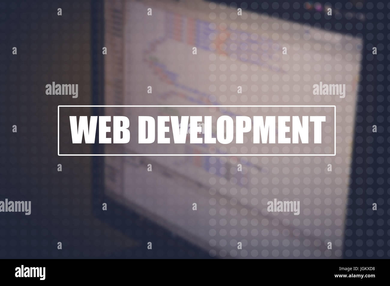 web development with code on screen blurring background Stock Photo - Alamy