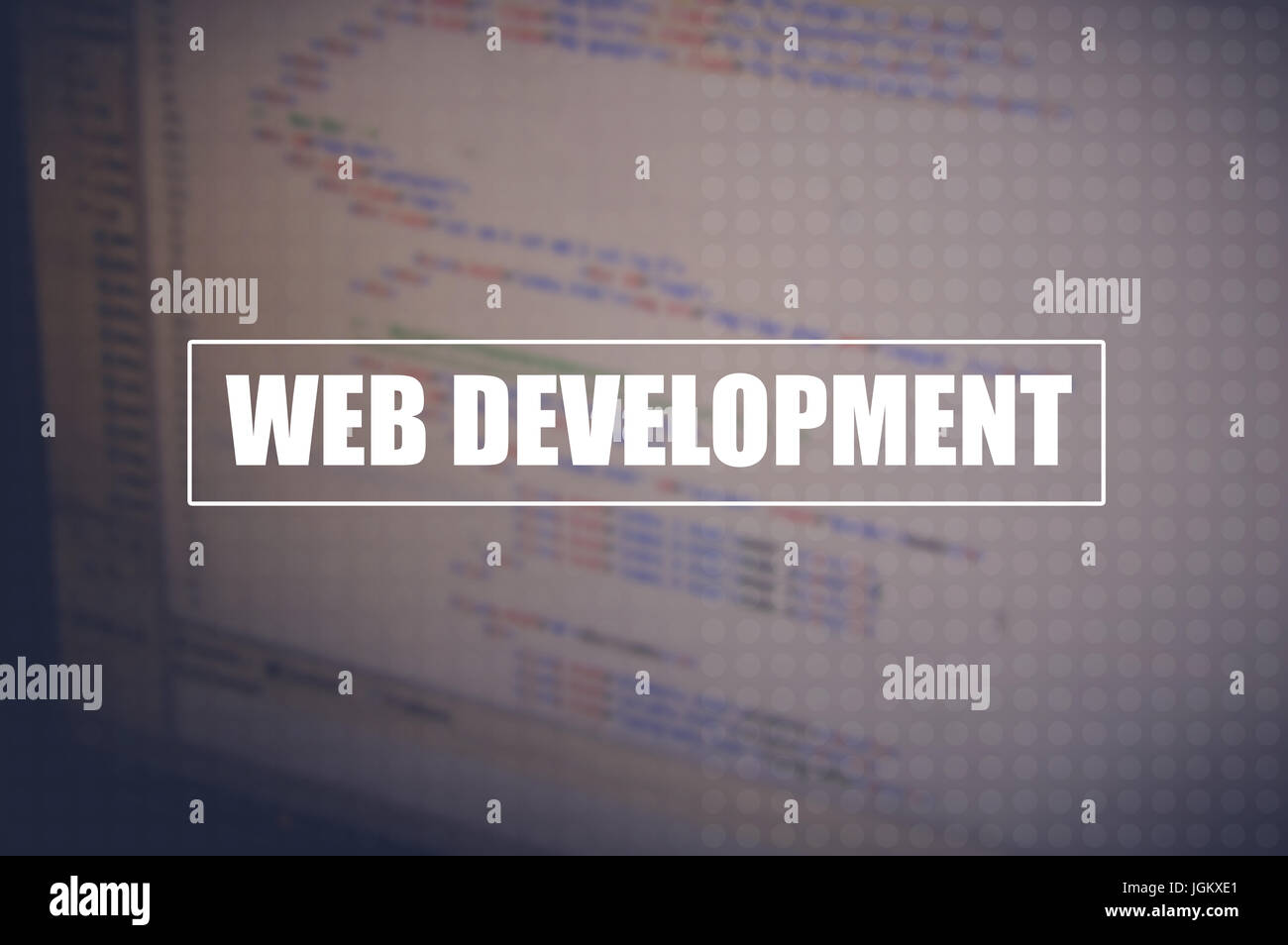 web development with code on screen blurring background Stock Photo - Alamy