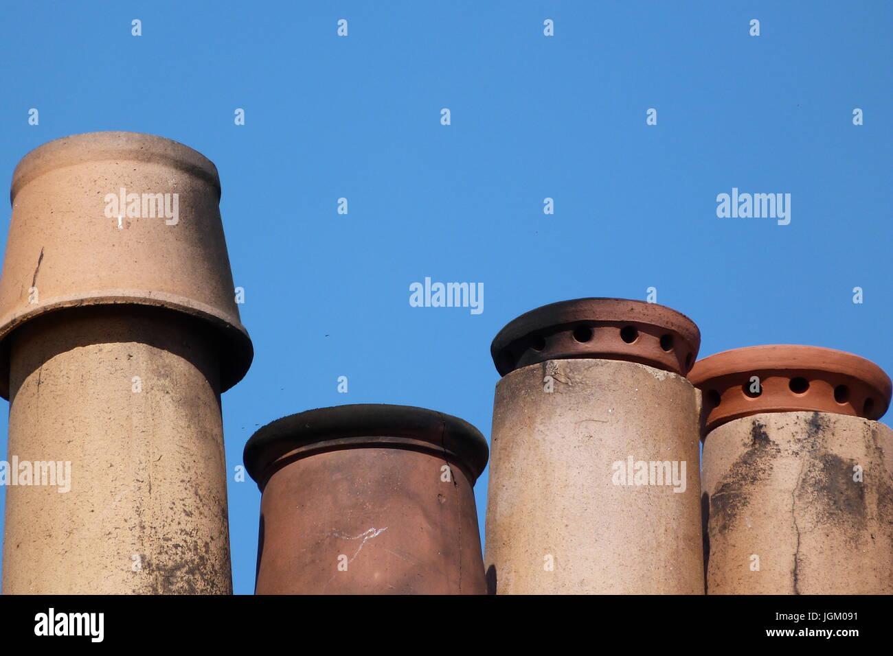 Ceramic chimney pots hi-res stock photography and images - Alamy
