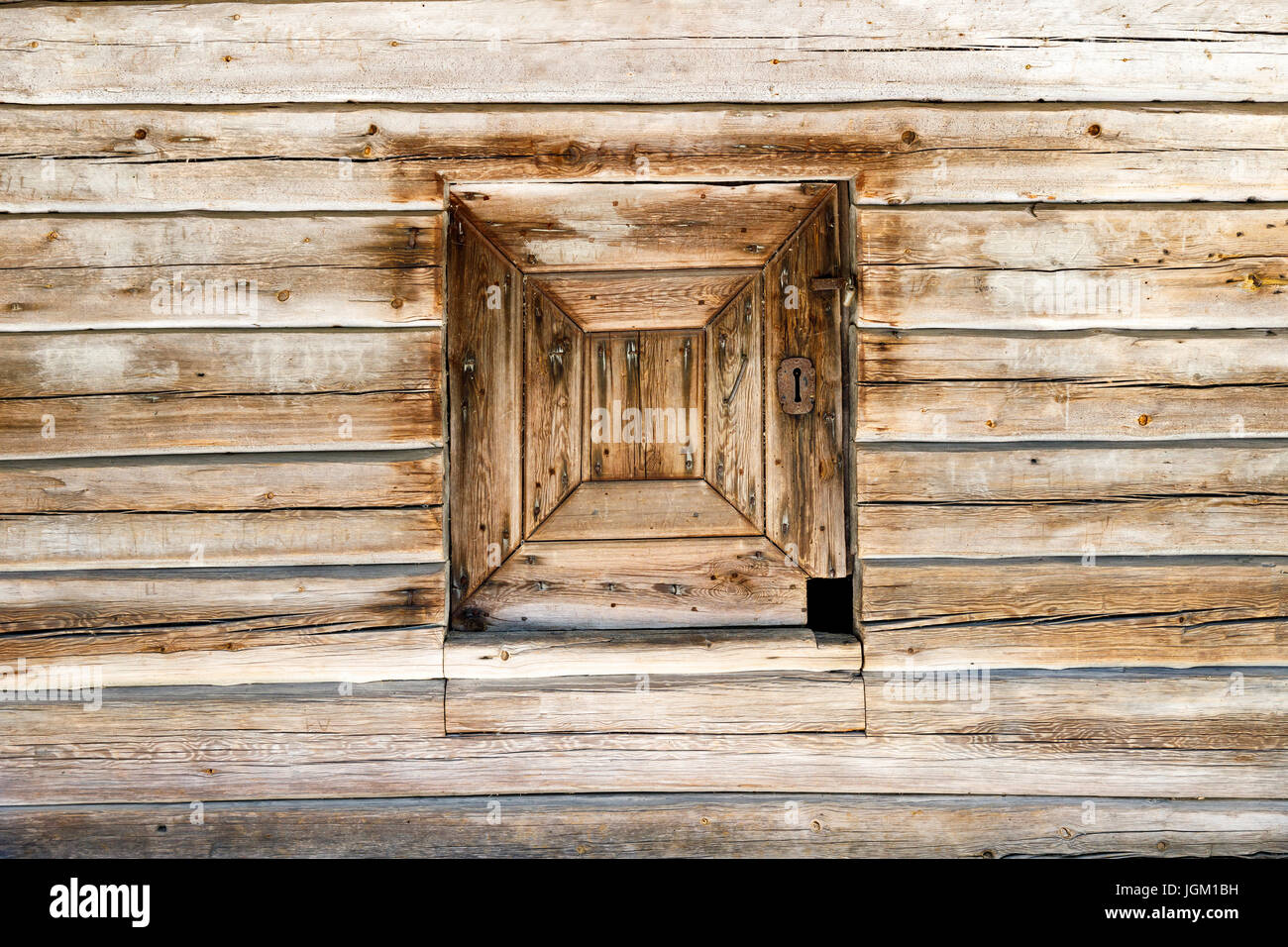 Timber made hatch in a wooden wall Stock Photo - Alamy