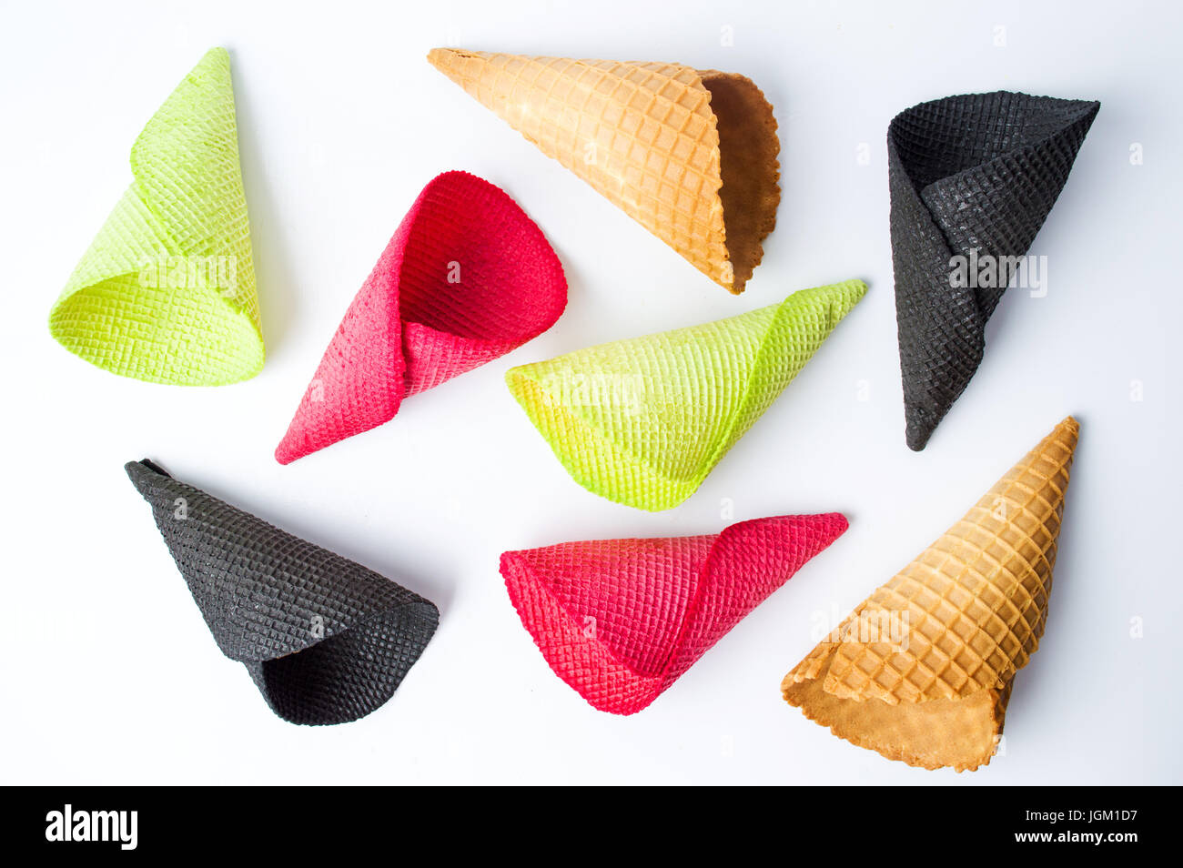 Colorful ice cream cones isolated on white background Stock Photo - Alamy