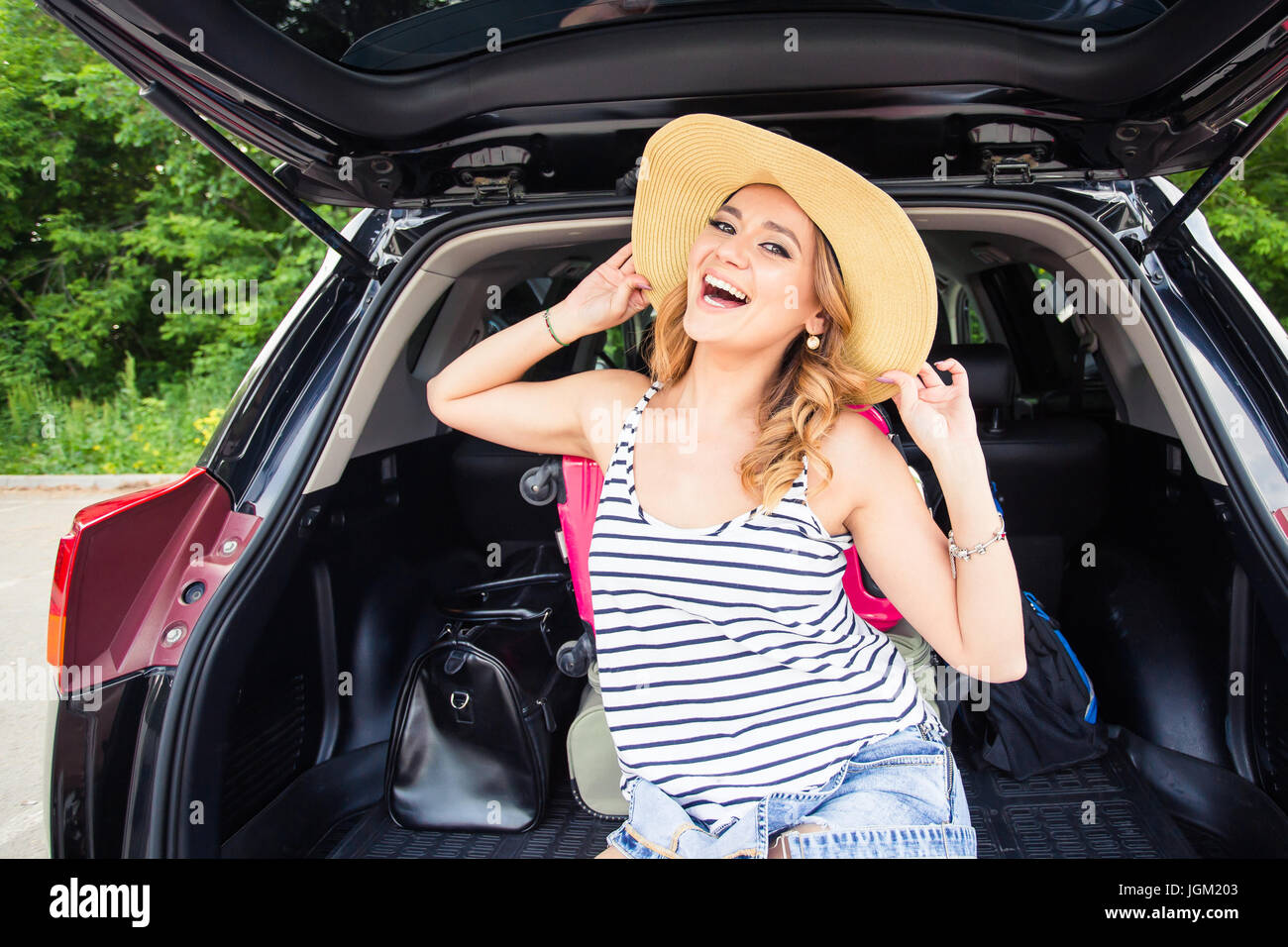 Summer vacation car road trip freedom concept. Happy woman cheering ...