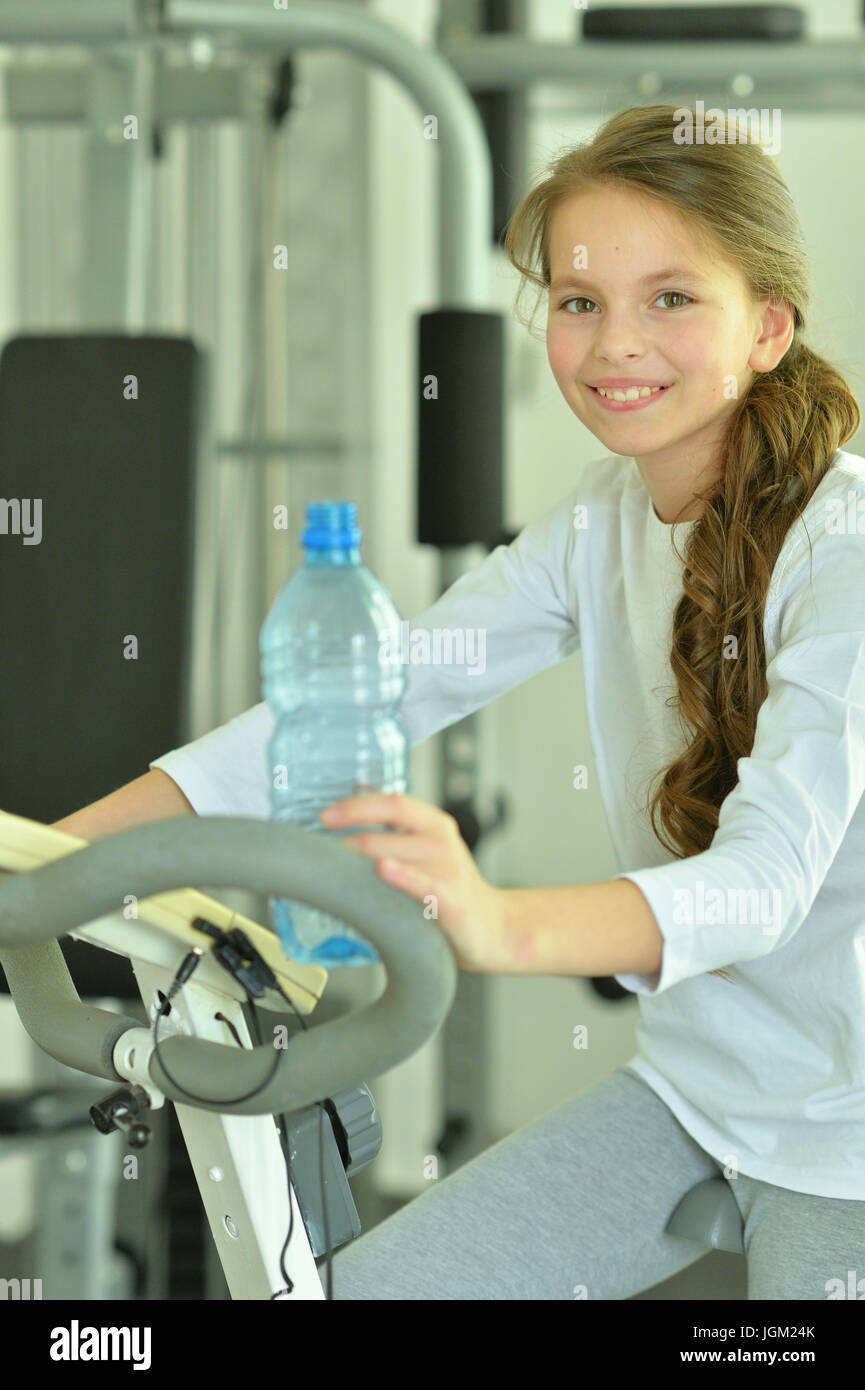 Little girl doing exercises Stock Photo - Alamy