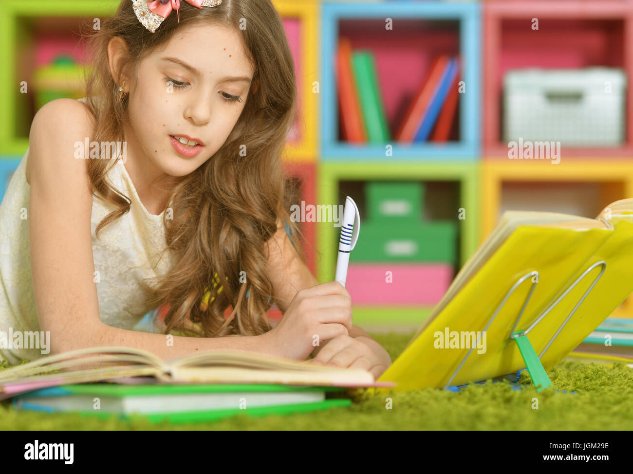 cute girl doing homework Stock Photo - Alamy