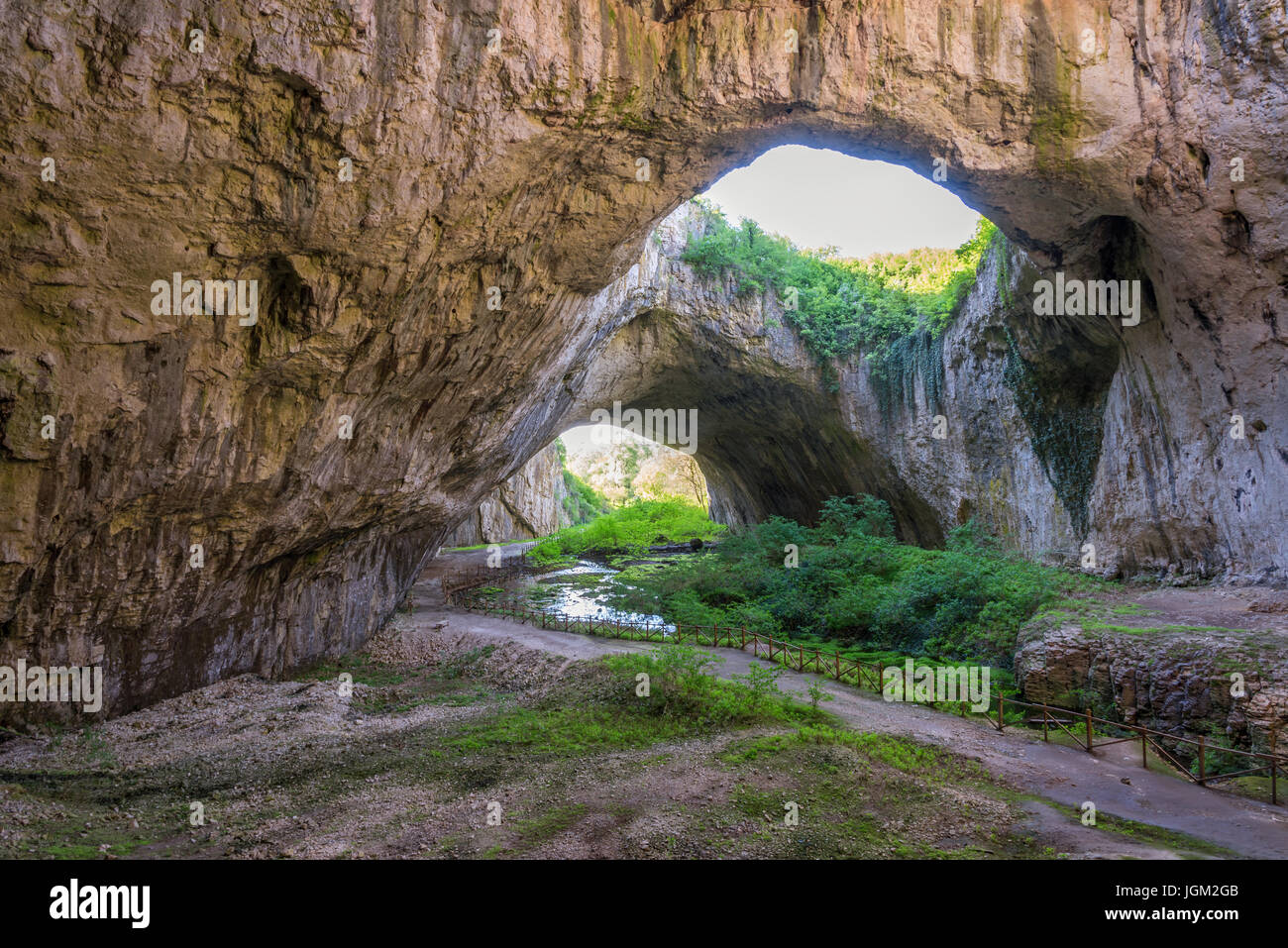 Magnificent view of the Devetaki cave, Bulgaria at summer Stock Photo ...