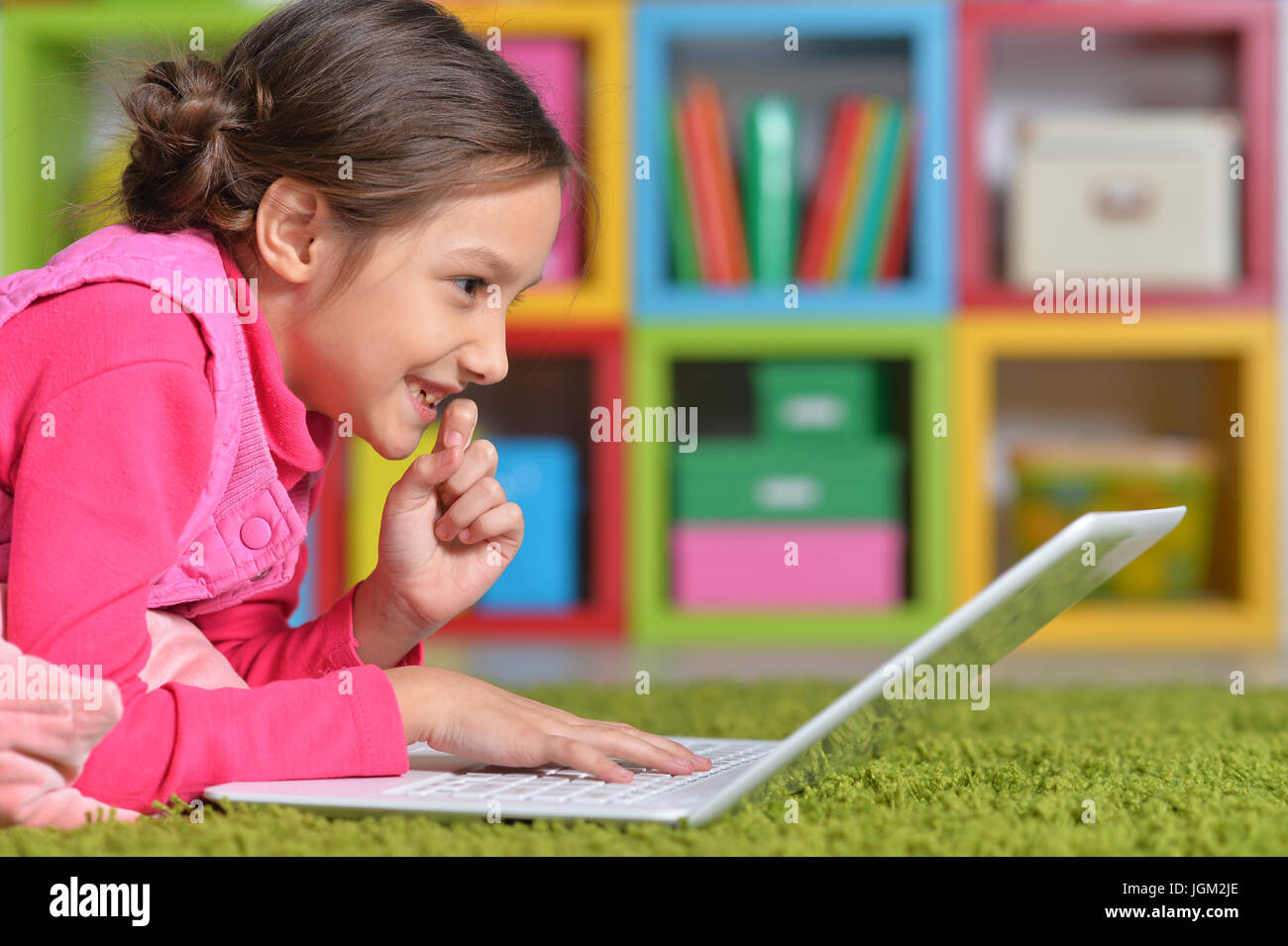 little girl using laptop Stock Photo - Alamy