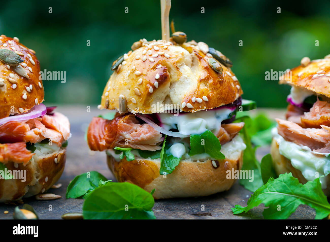 Seeded brioche buns with hot smoked salmon, beetroot and rocket salad ...