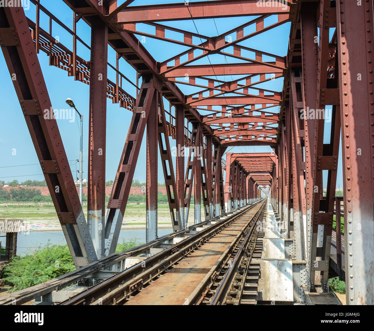 Old railway steel bridge in Agra, India. Agra is a major tourist ...