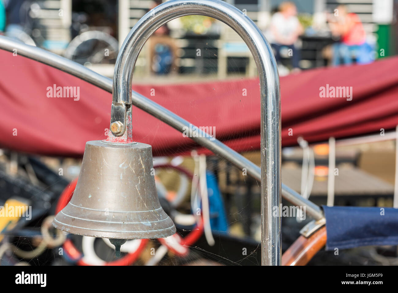Brass ship bell on a classic sailboat. Close Up Stock Photo - Alamy