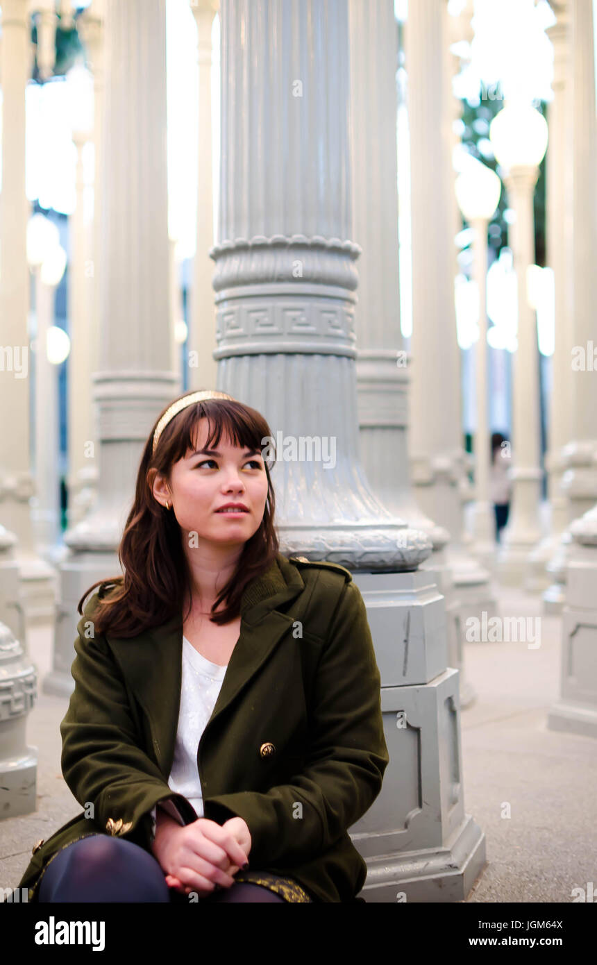 Girl posing at LACMA Urban Light exhibit Stock Photo - Alamy