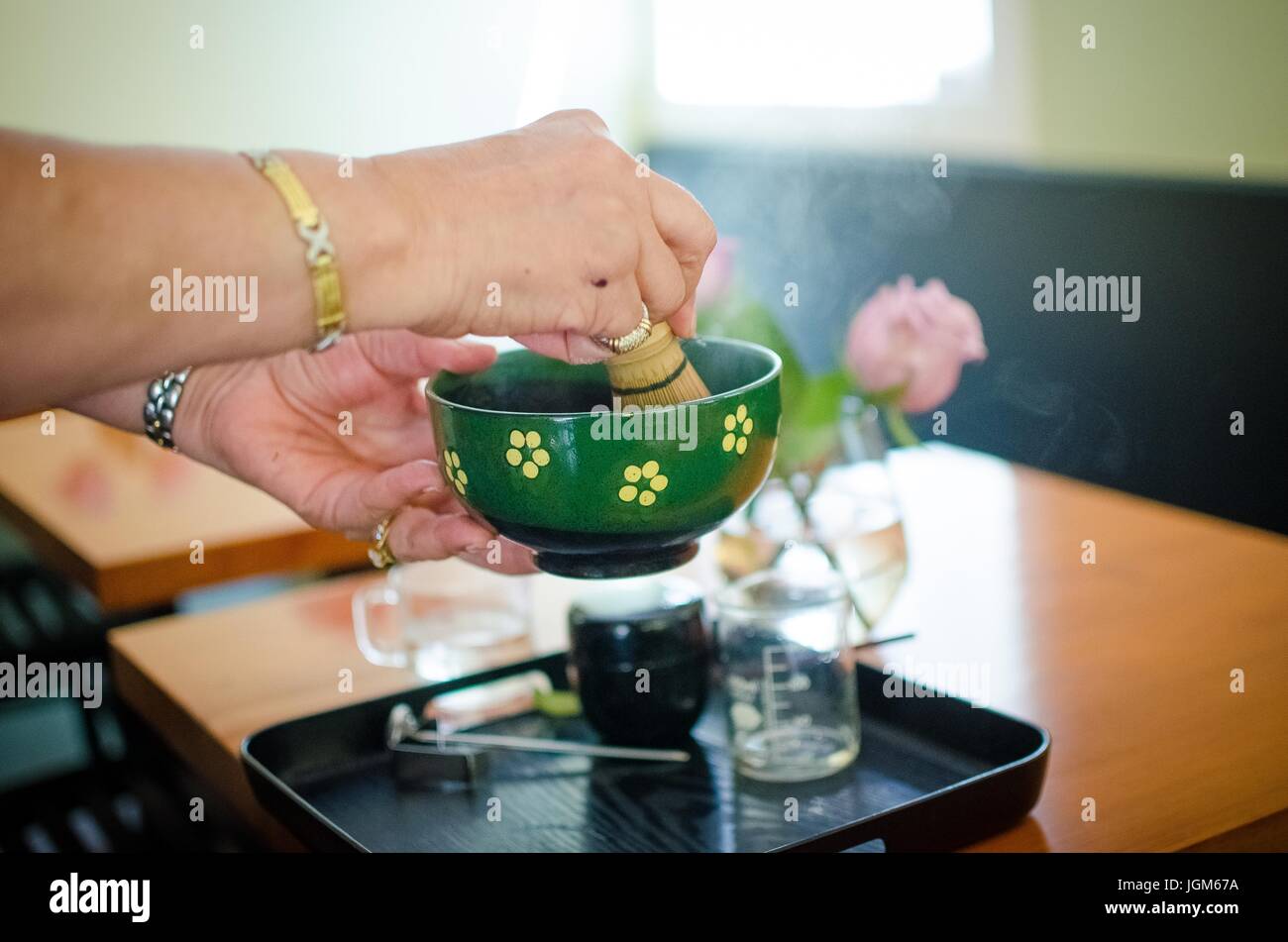 Woman stirring matcha in hi-res stock photography and images - Alamy