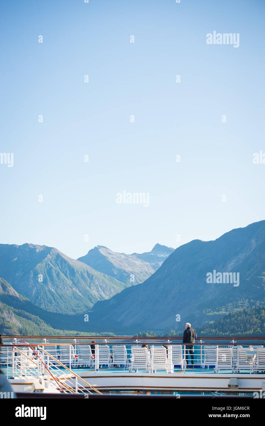 Guest on the roof of a cruise ship looking at the view Stock Photo - Alamy