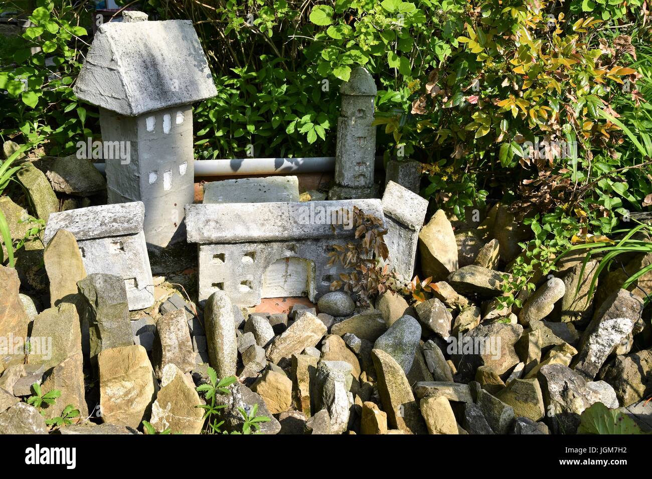 handmade village house and ruins of the old castle Stock Photo - Alamy