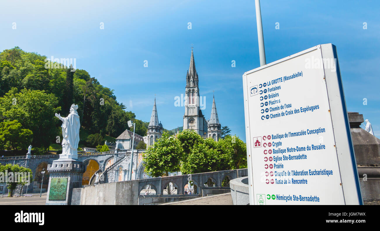 Lourdes, FRANCE, June 22, 2017 - Sign of direction in front of the ...