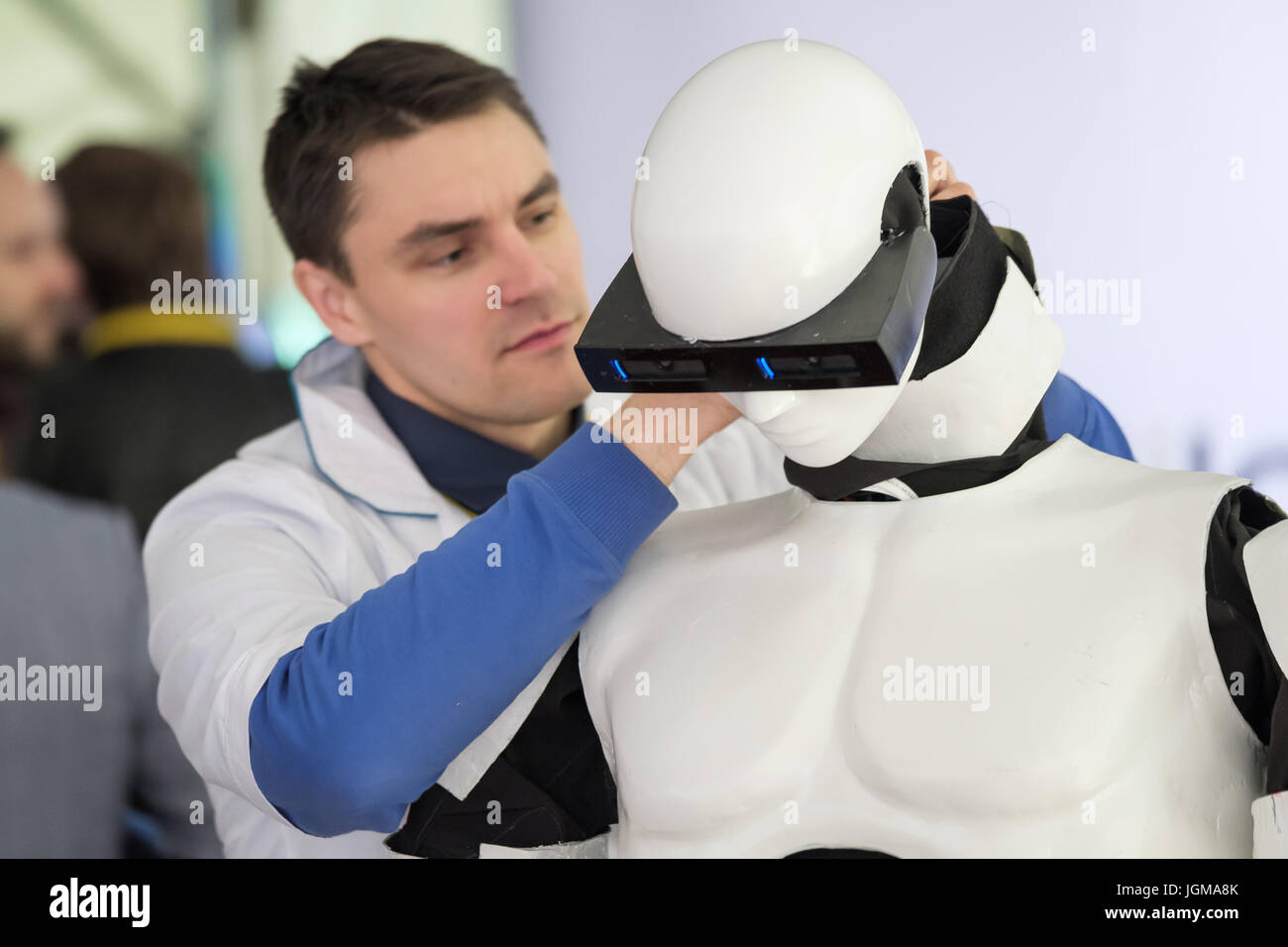 Engineer repair the robot at Startup Village Stock Photo - Alamy