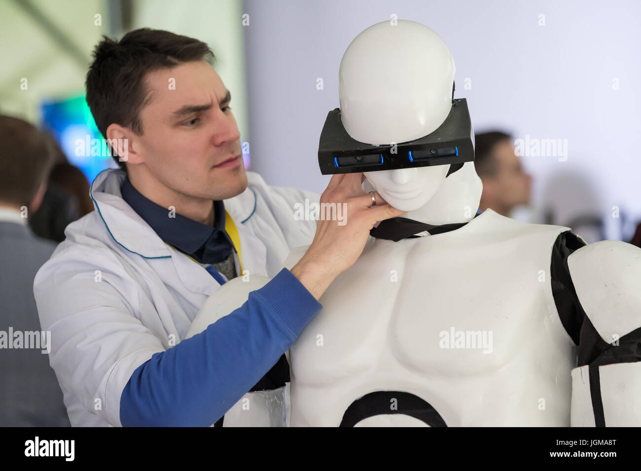 Engineer repair the robot at Startup Village Stock Photo - Alamy
