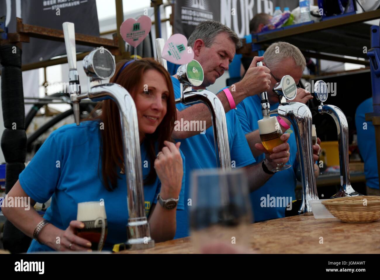 Bar Staff serving customers at the 2017 Stonehaven Beer Festival Stock ...