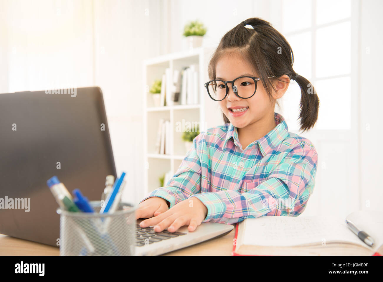 cheerfully cute girl children excited using computer learning ...