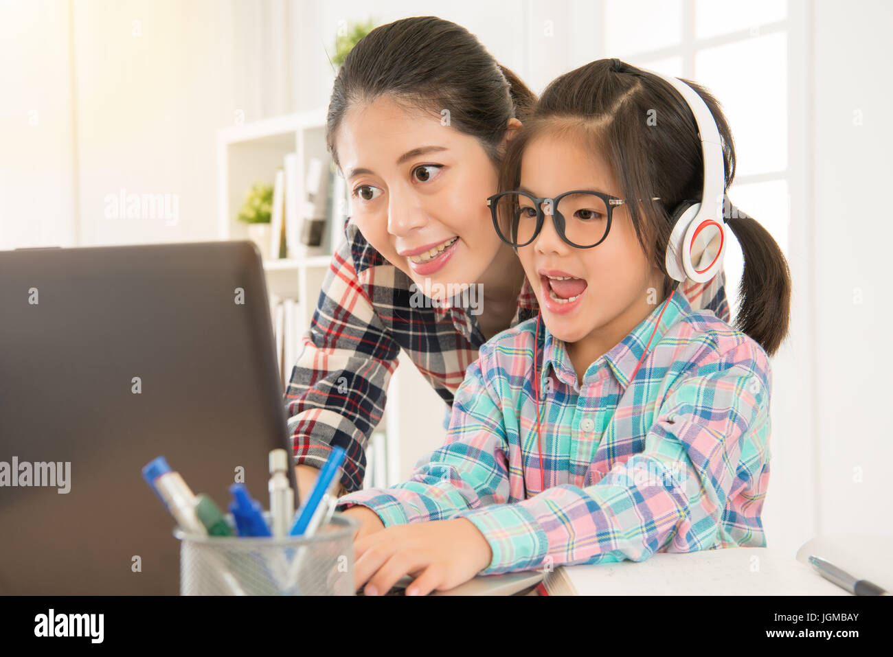 Mother child pc keyboard hi-res stock photography and images - Alamy