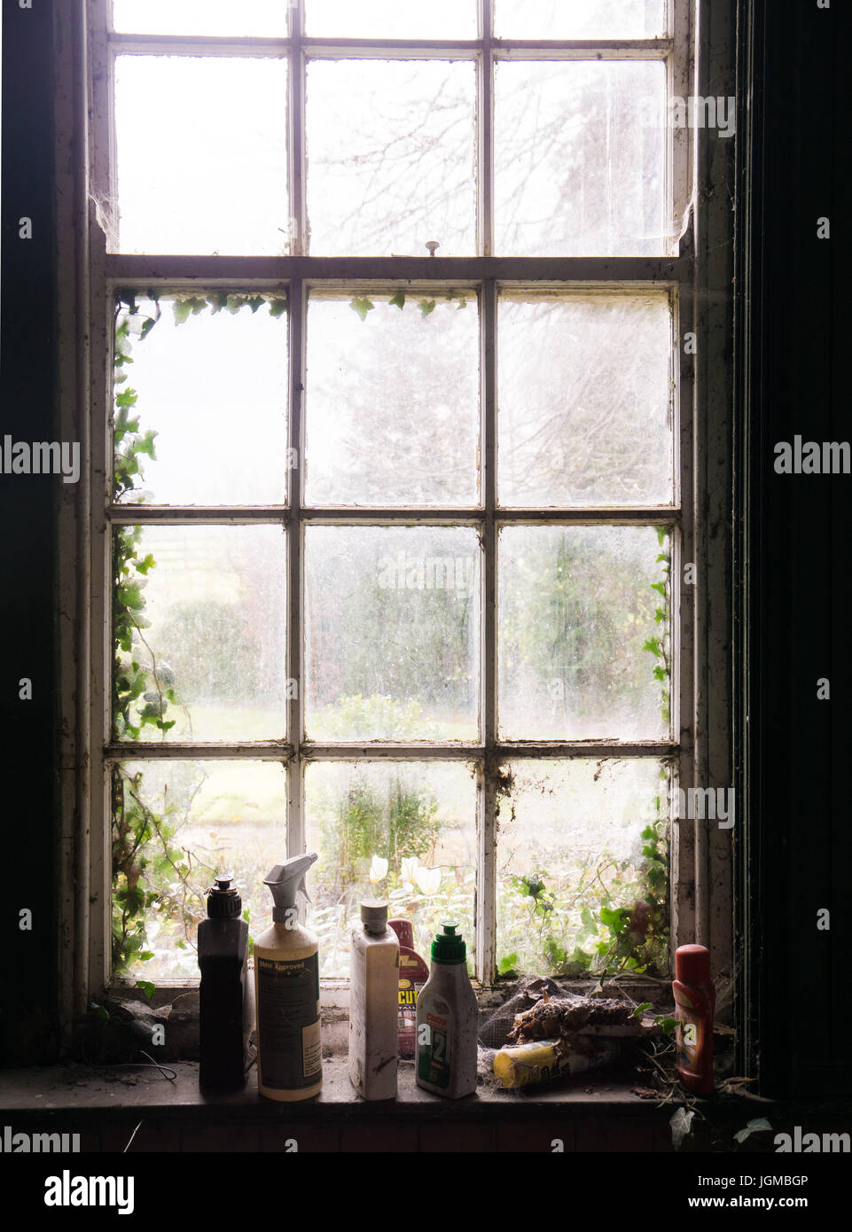 An old and dirty window with a feeling of neglect and melancholy Stock ...