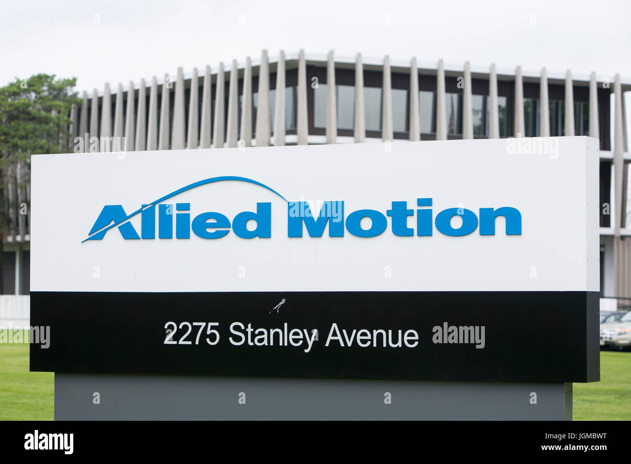 A logo sign outside of a facility occupied by Allied Motion ...