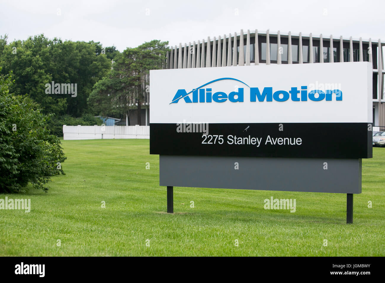 A logo sign outside of a facility occupied by Allied Motion ...