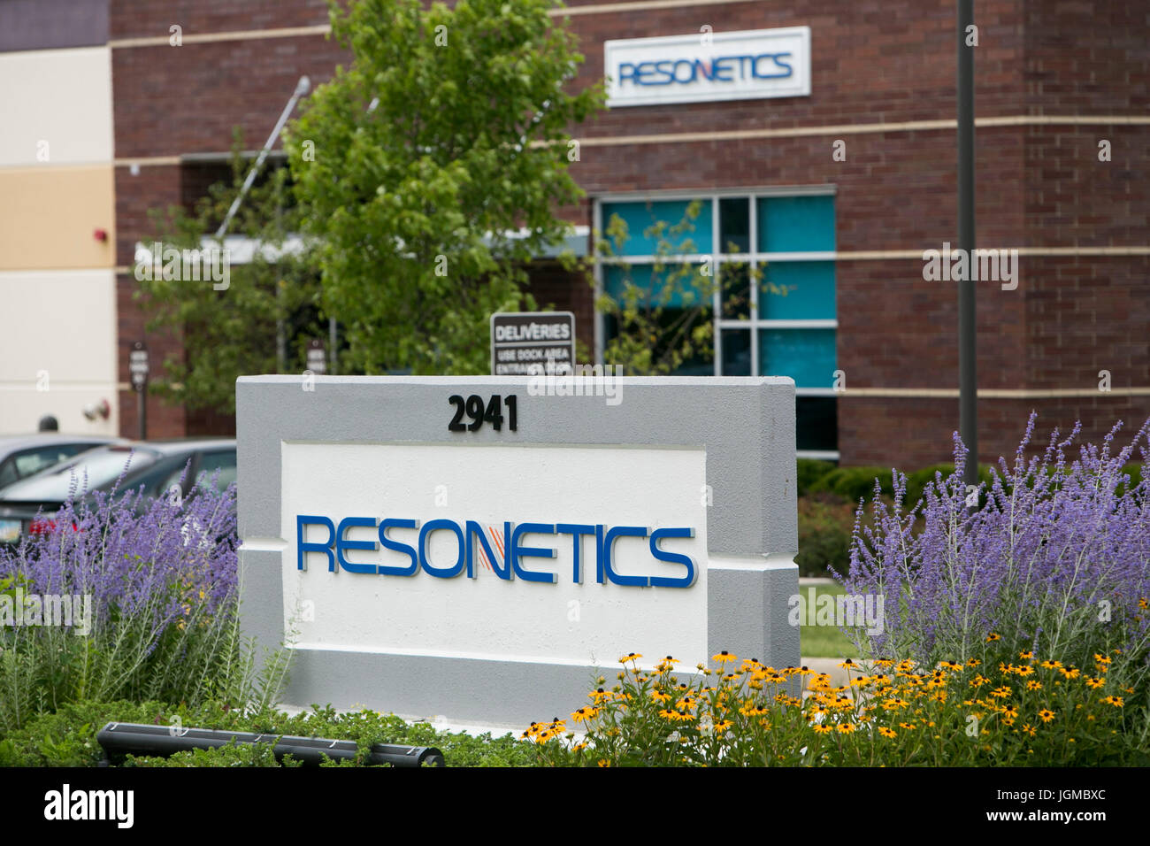 A logo sign outside of a facility occupied by Resonetics in Kettering ...
