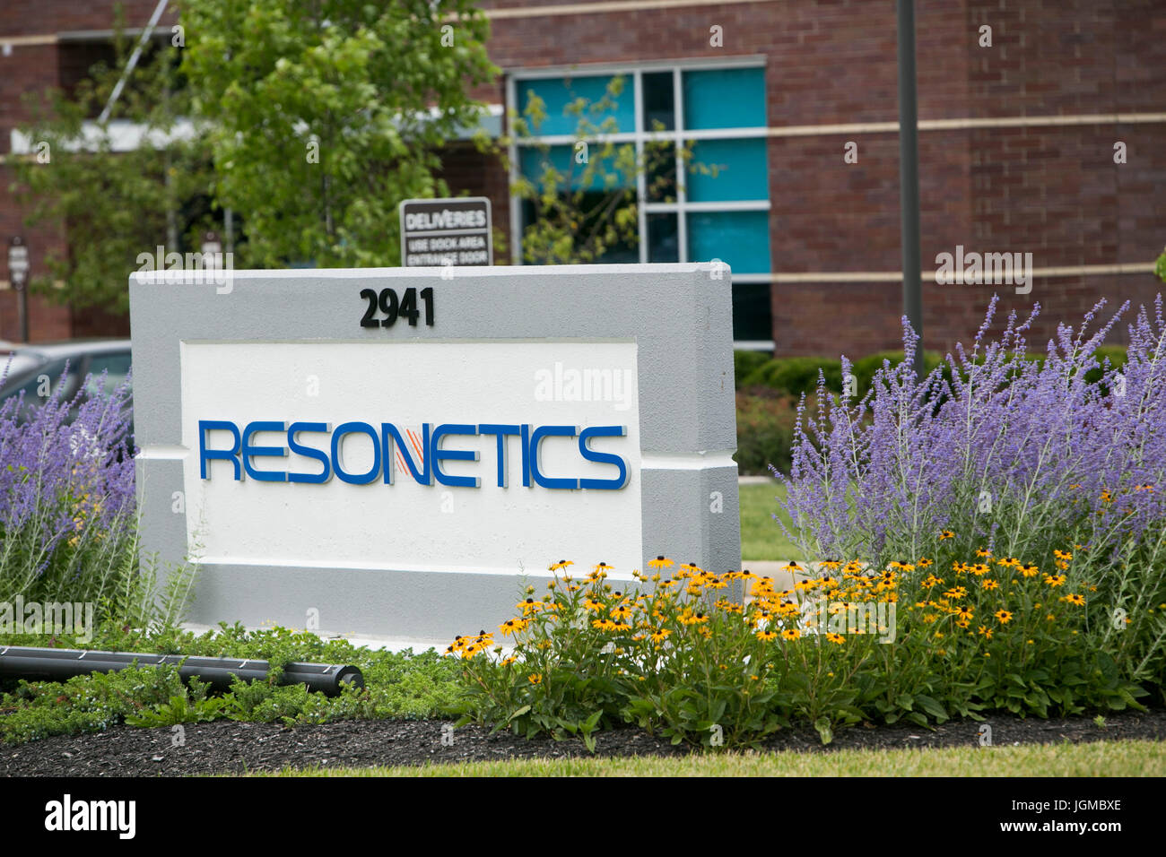 A logo sign outside of a facility occupied by Resonetics in Kettering ...