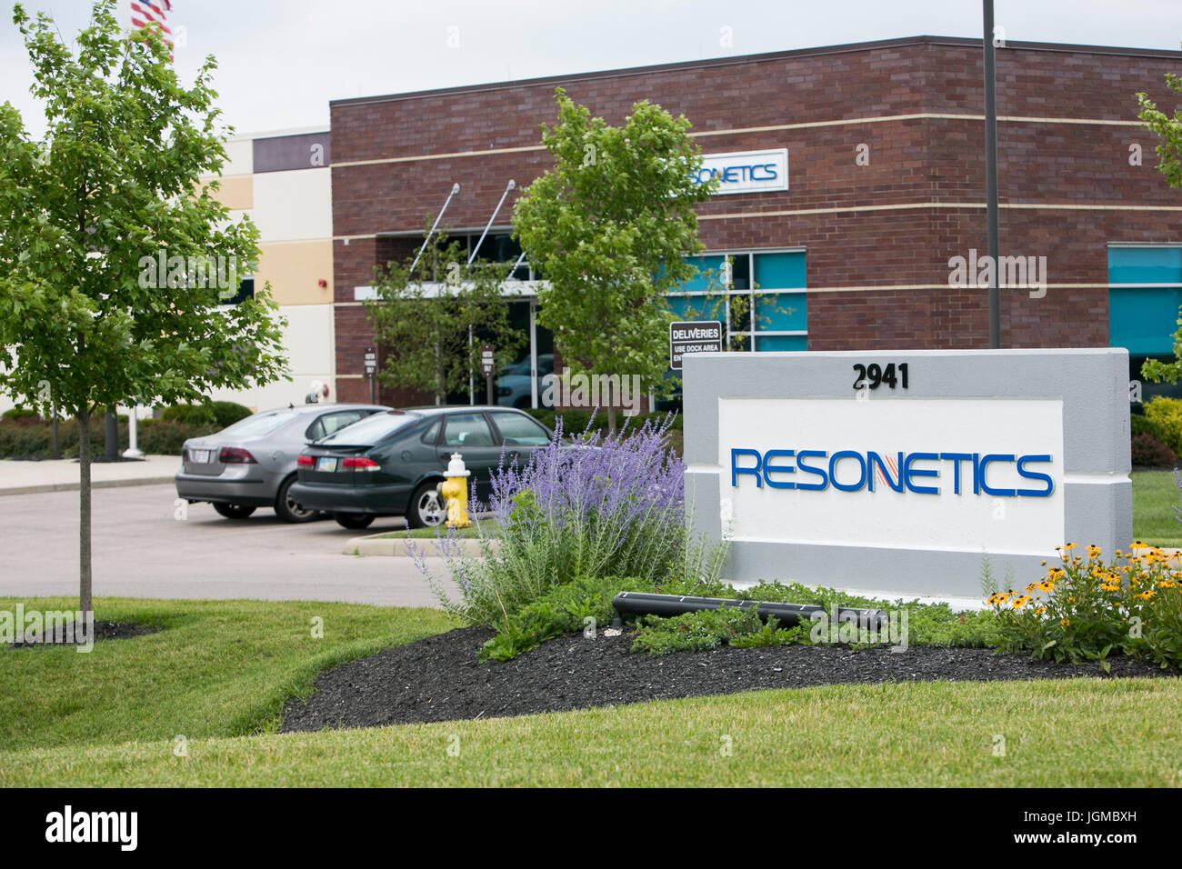 A logo sign outside of a facility occupied by Resonetics in Kettering ...