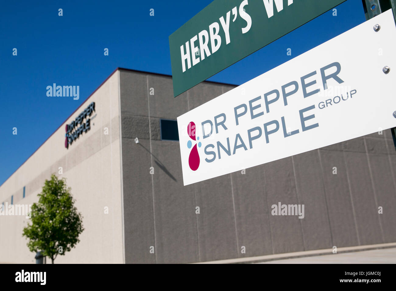 A logo sign outside of a facility occupied by the Dr Pepper Snapple ...