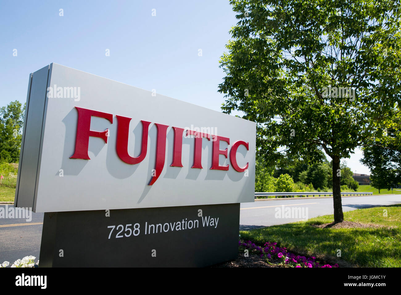 A logo sign outside of a facility occupied by Fujitec America in Mason ...
