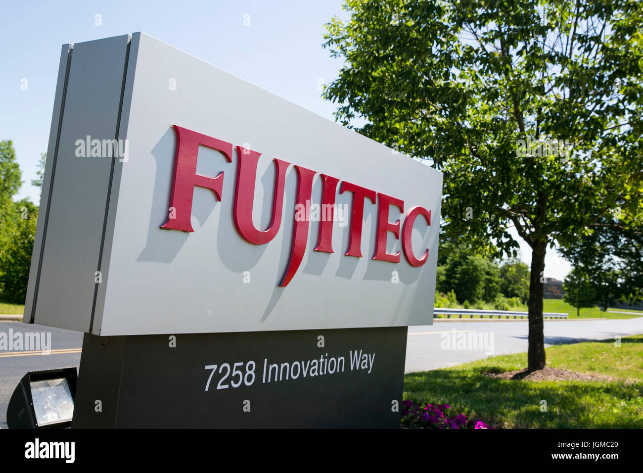 A logo sign outside of a facility occupied by Fujitec America in Mason ...