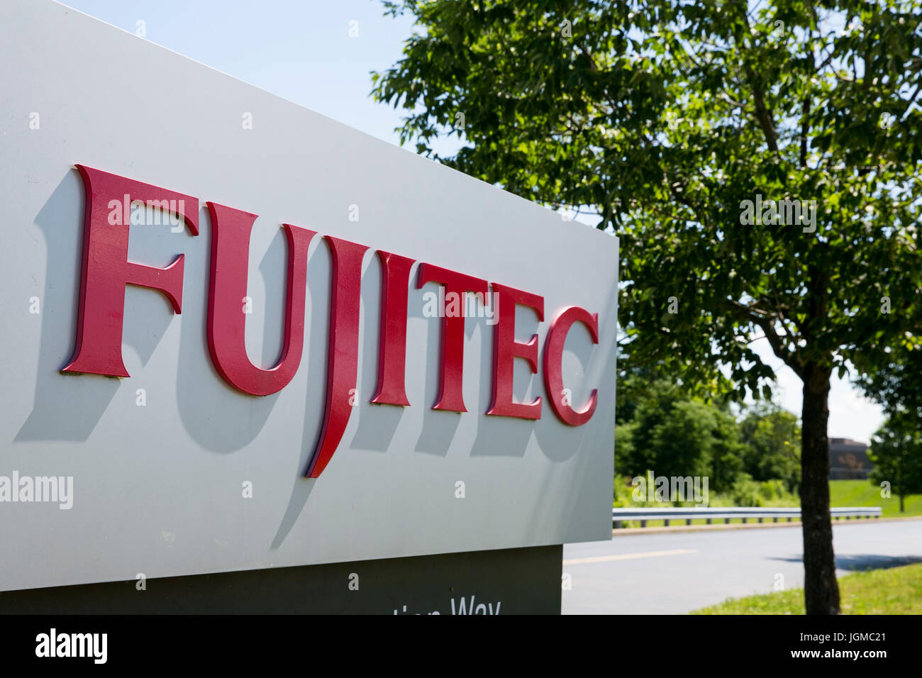 A logo sign outside of a facility occupied by Fujitec America in Mason ...