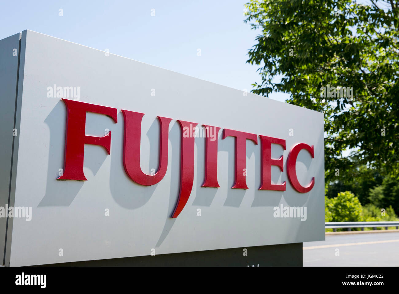 A logo sign outside of a facility occupied by Fujitec America in Mason ...