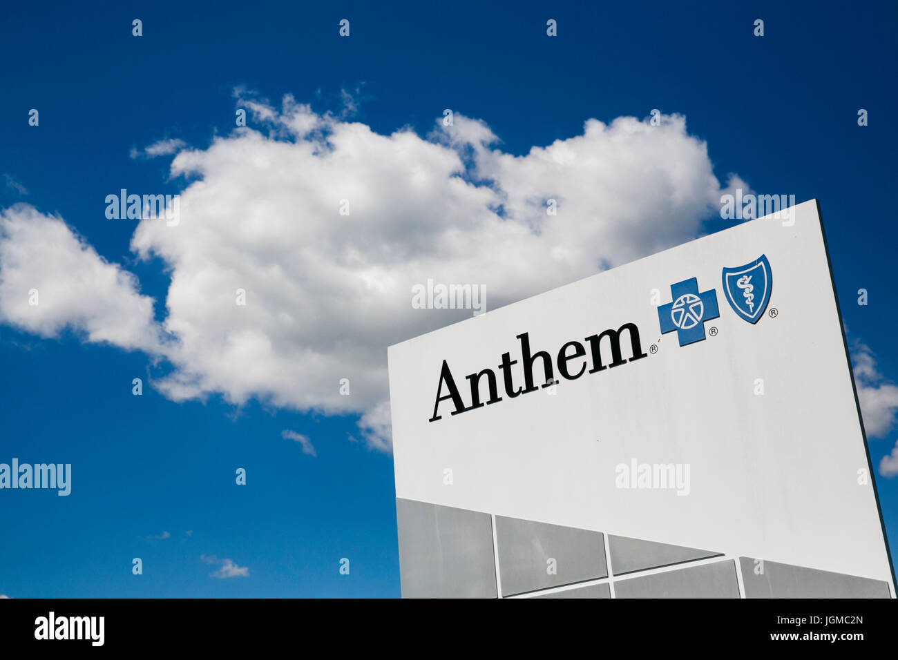 A logo sign outside of a facility occupied by the health insurer Anthem ...