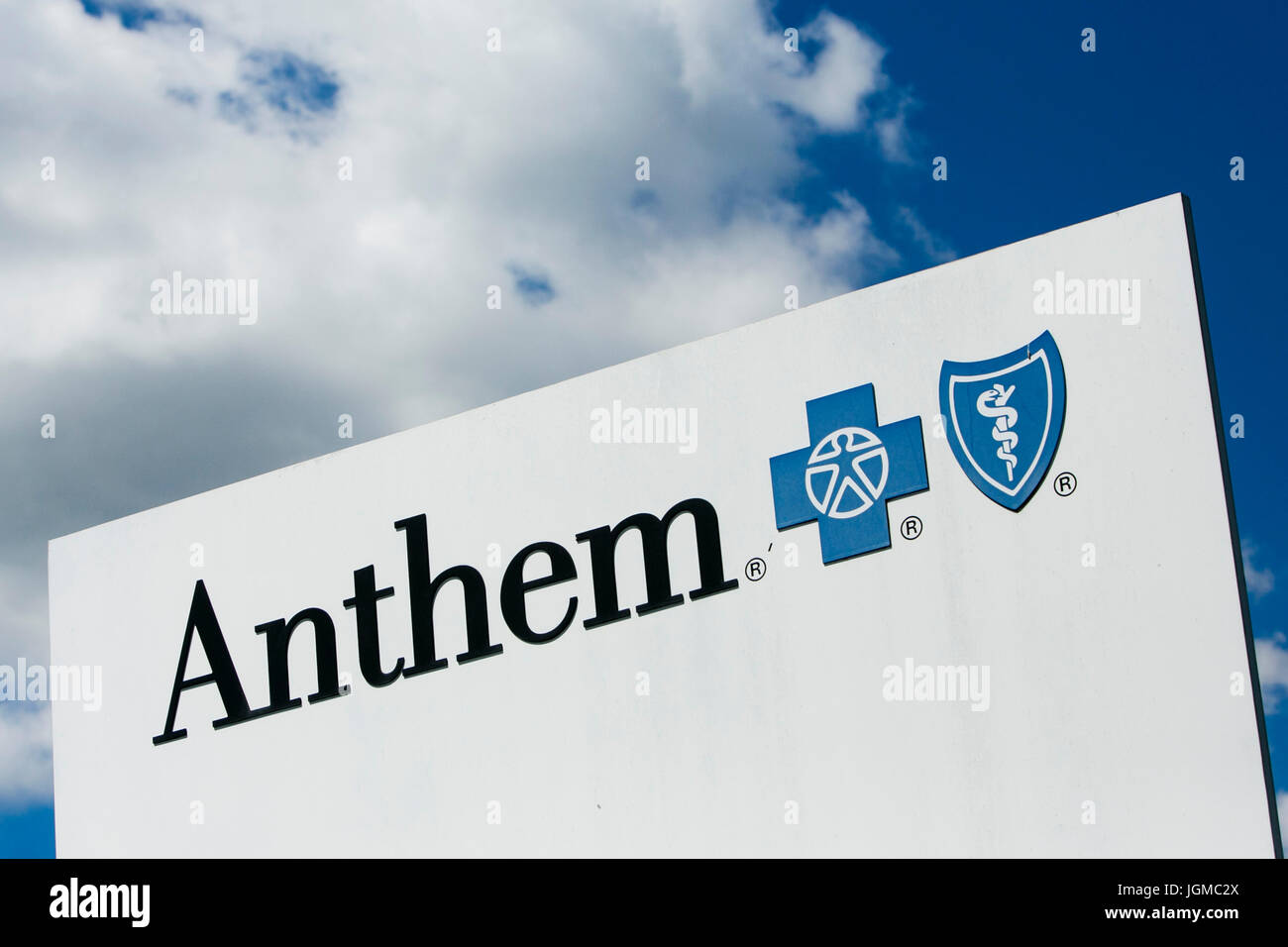 A logo sign outside of a facility occupied by the health insurer Anthem ...