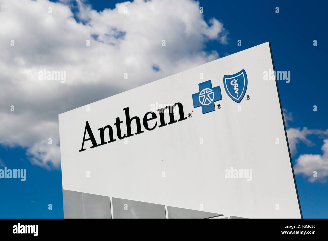 A logo sign outside of a facility occupied by the health insurer Anthem ...