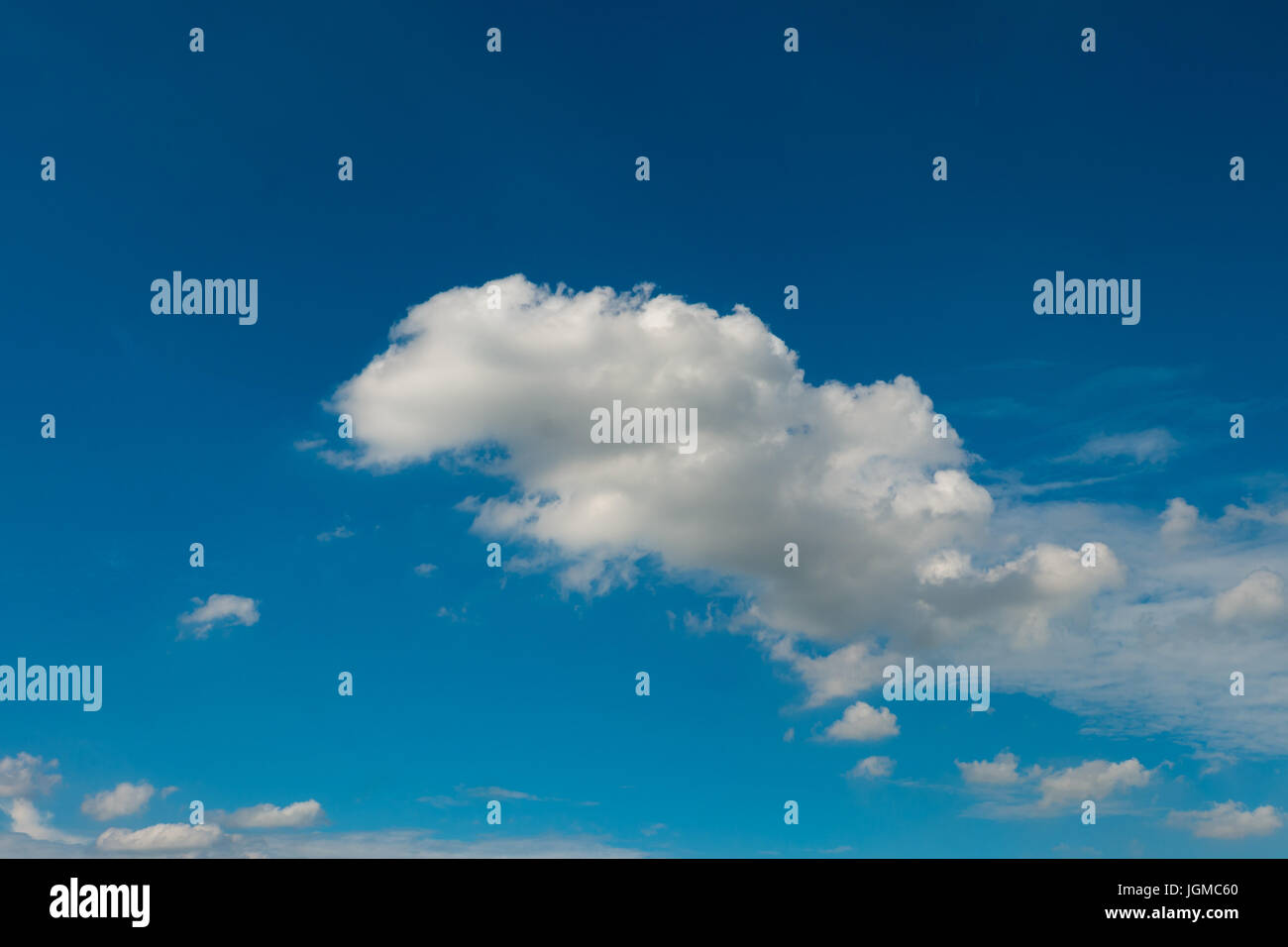 Clear blue sky with clouds with blank space Stock Photo - Alamy