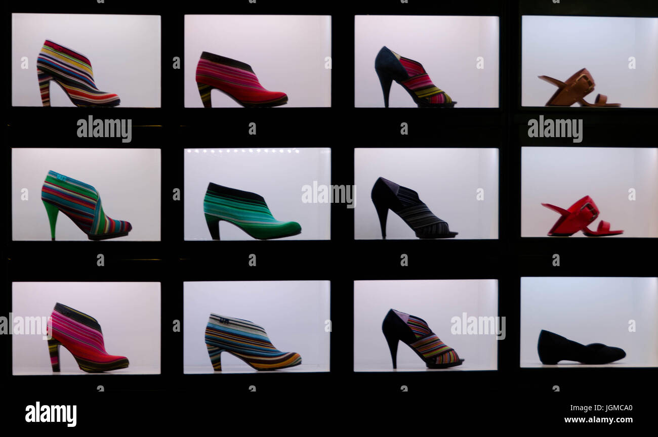Cubicle shoe display of colorful women's shoes Stock Photo - Alamy